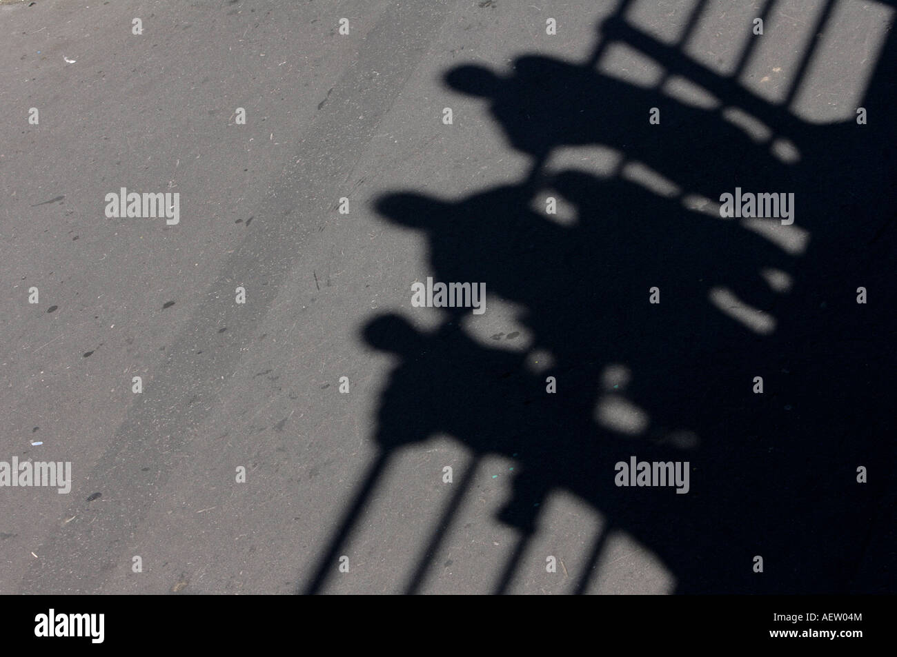 human shadows people on the fence Stock Photo - Alamy