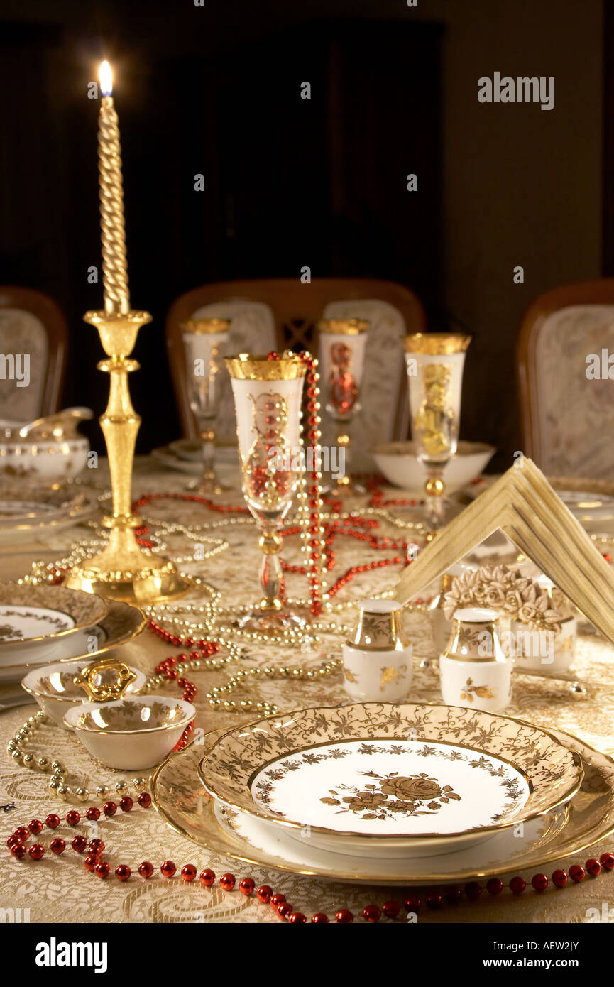 Table with gold dishes Stock Photo - Alamy