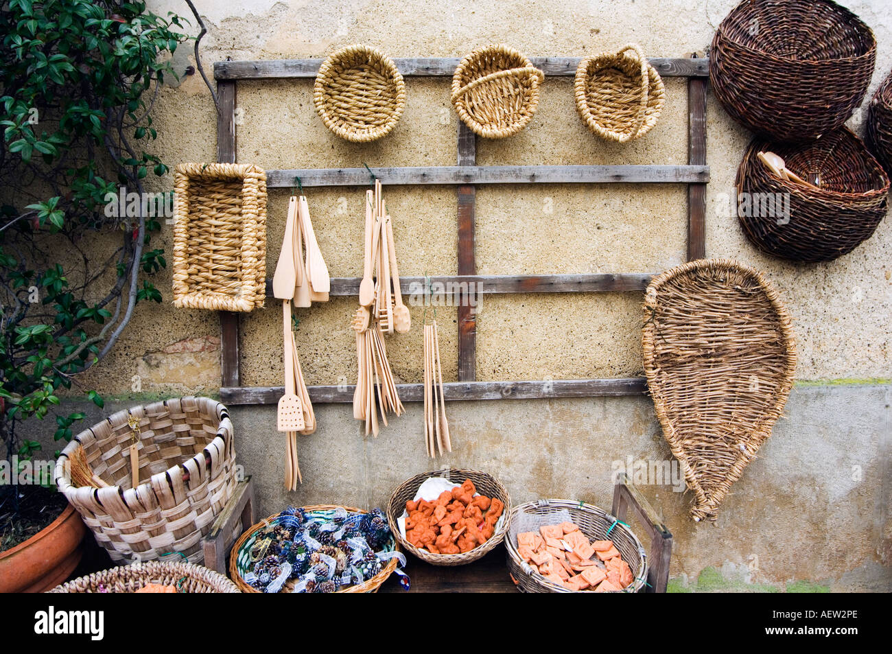 straw basket display on wall Monteriggioni medieval walled town Tuscany ...