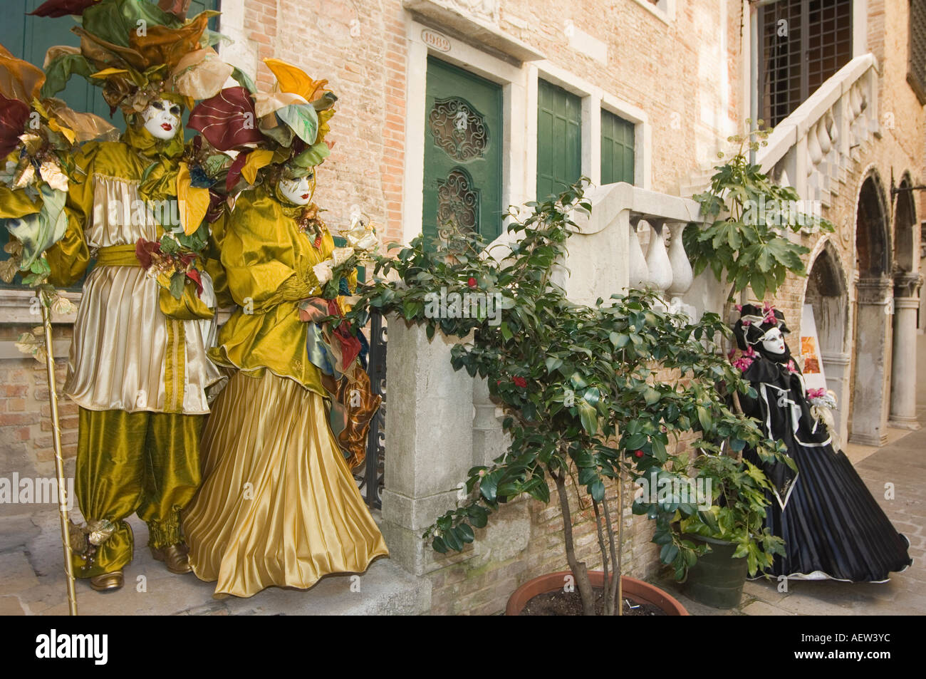 masked faces and costumes at the Venice Carnival St Marks Square Venice ...