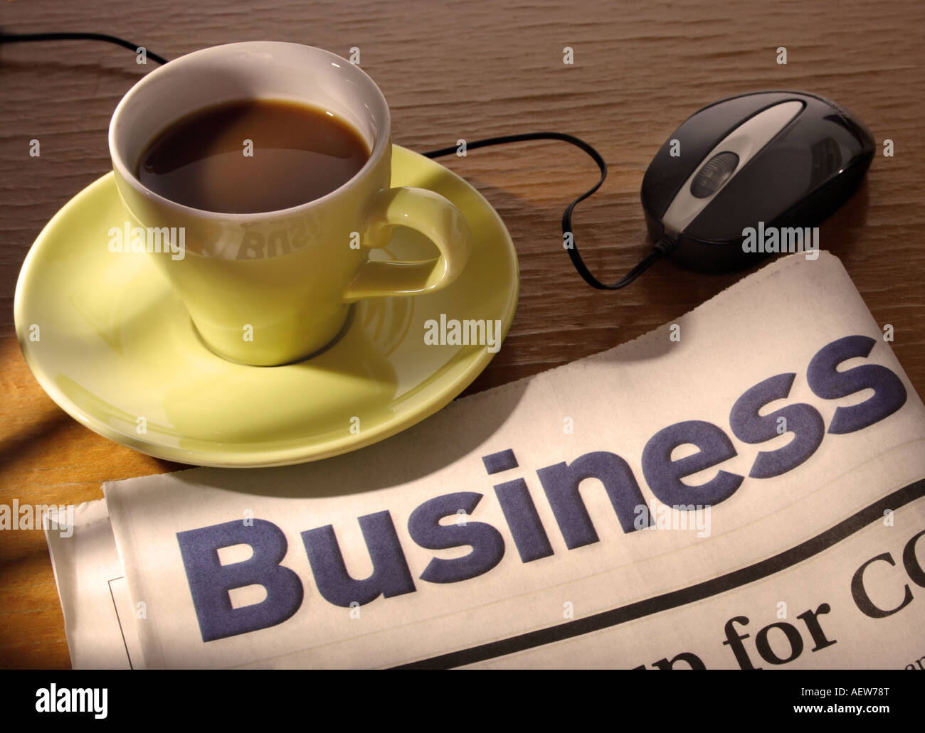 Coffee Newspaper and Mouse on Desk Stock Photo - Alamy