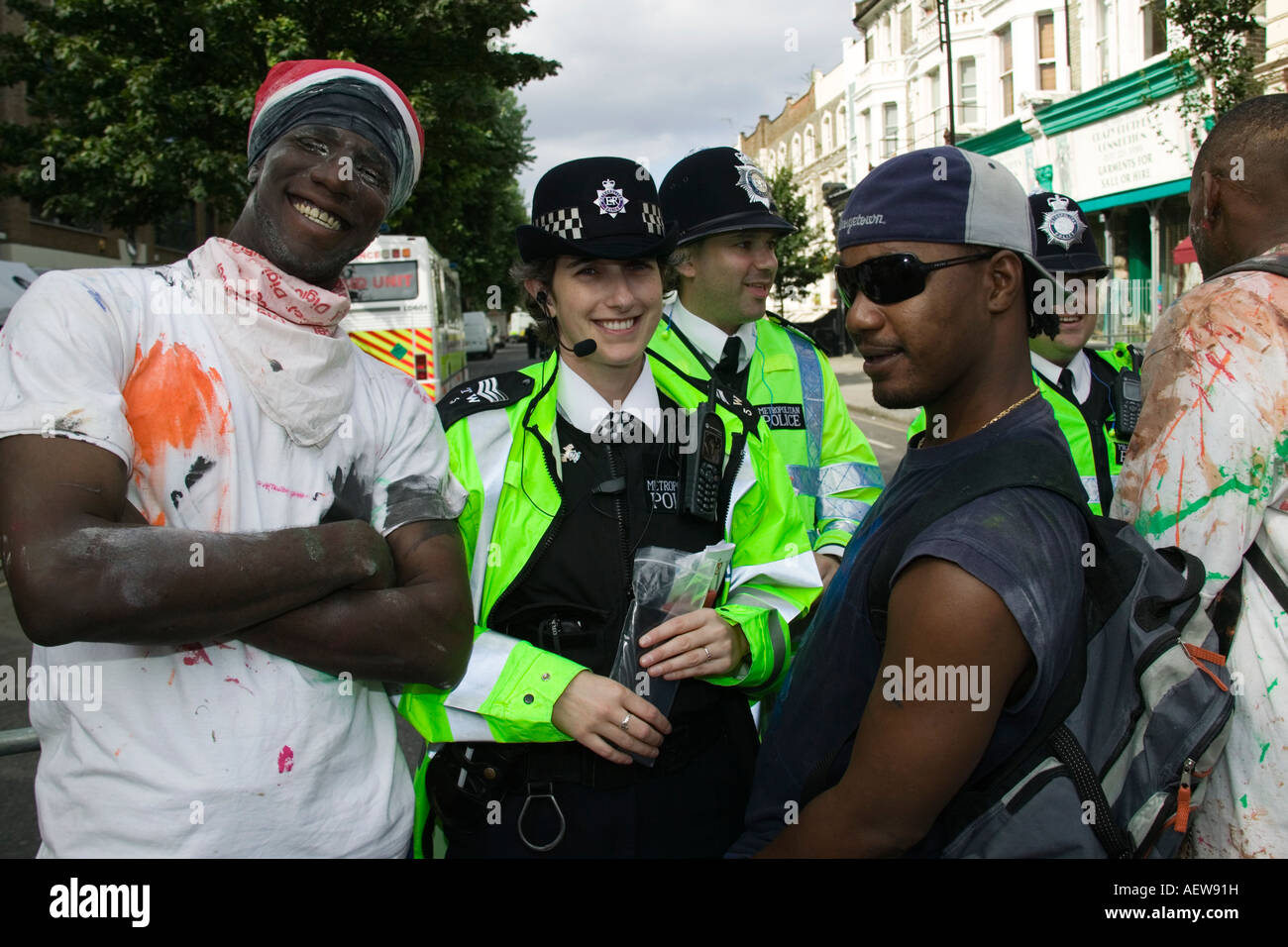 Notting Hill Carnival. Black men with white female police officer at J ...
