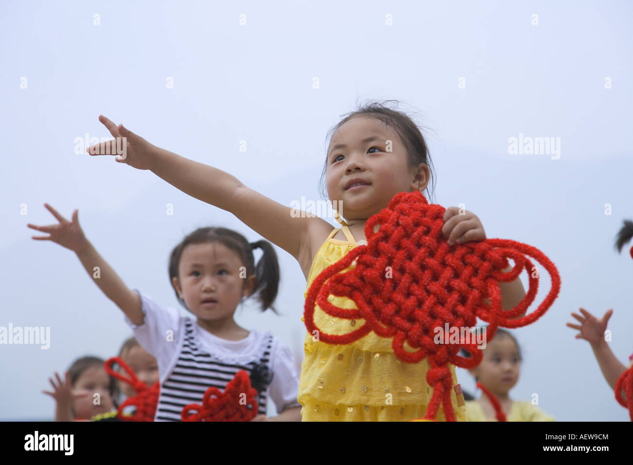 Children's dance performing in the square Sichuan Province China Stock ...