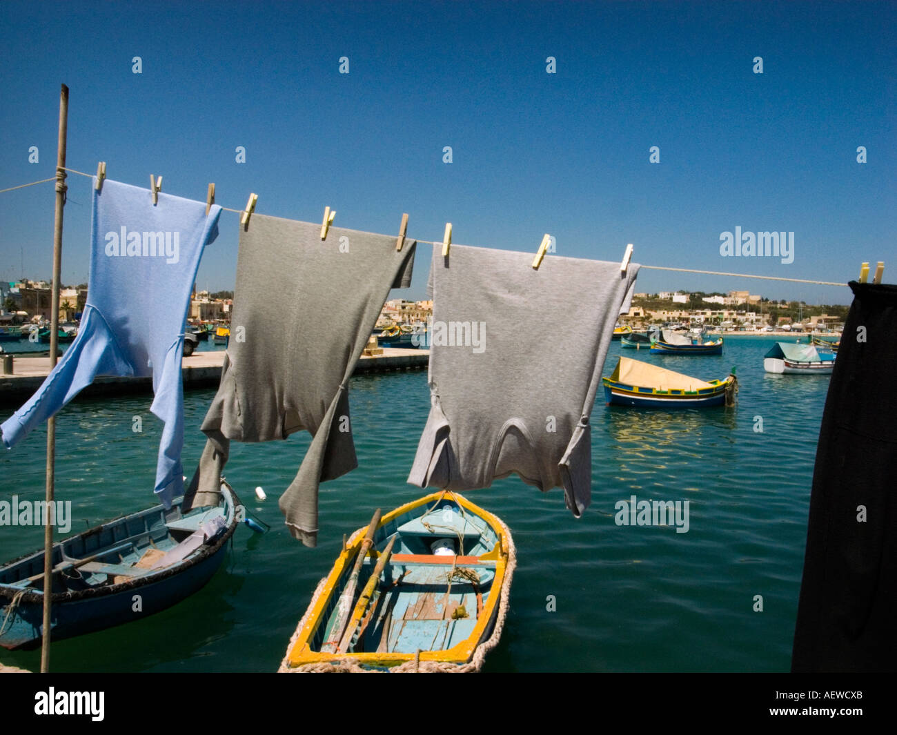 laundry on washing line ,Marsaxlokk fishing village,Malta Stock Photo ...
