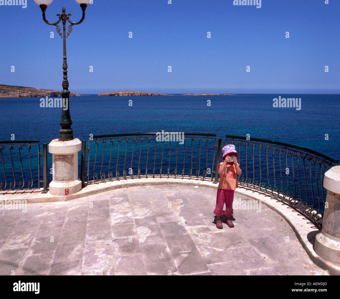 Little child taking photographs on a holiday,Grenada,Spain Stock Photo ...