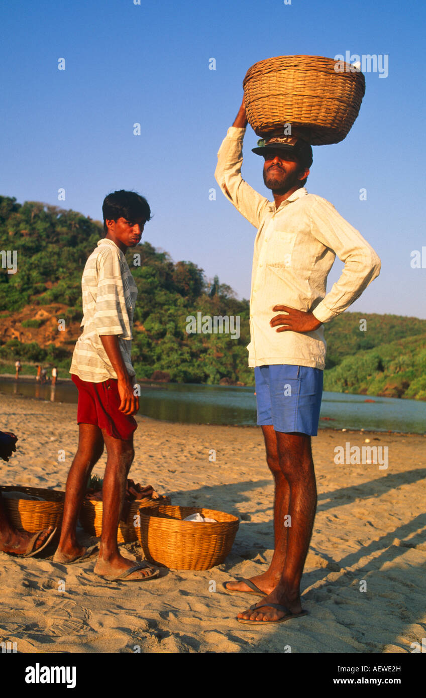 Indian Men Carrying Baskets Goa India Asia Stock Photo - Alamy