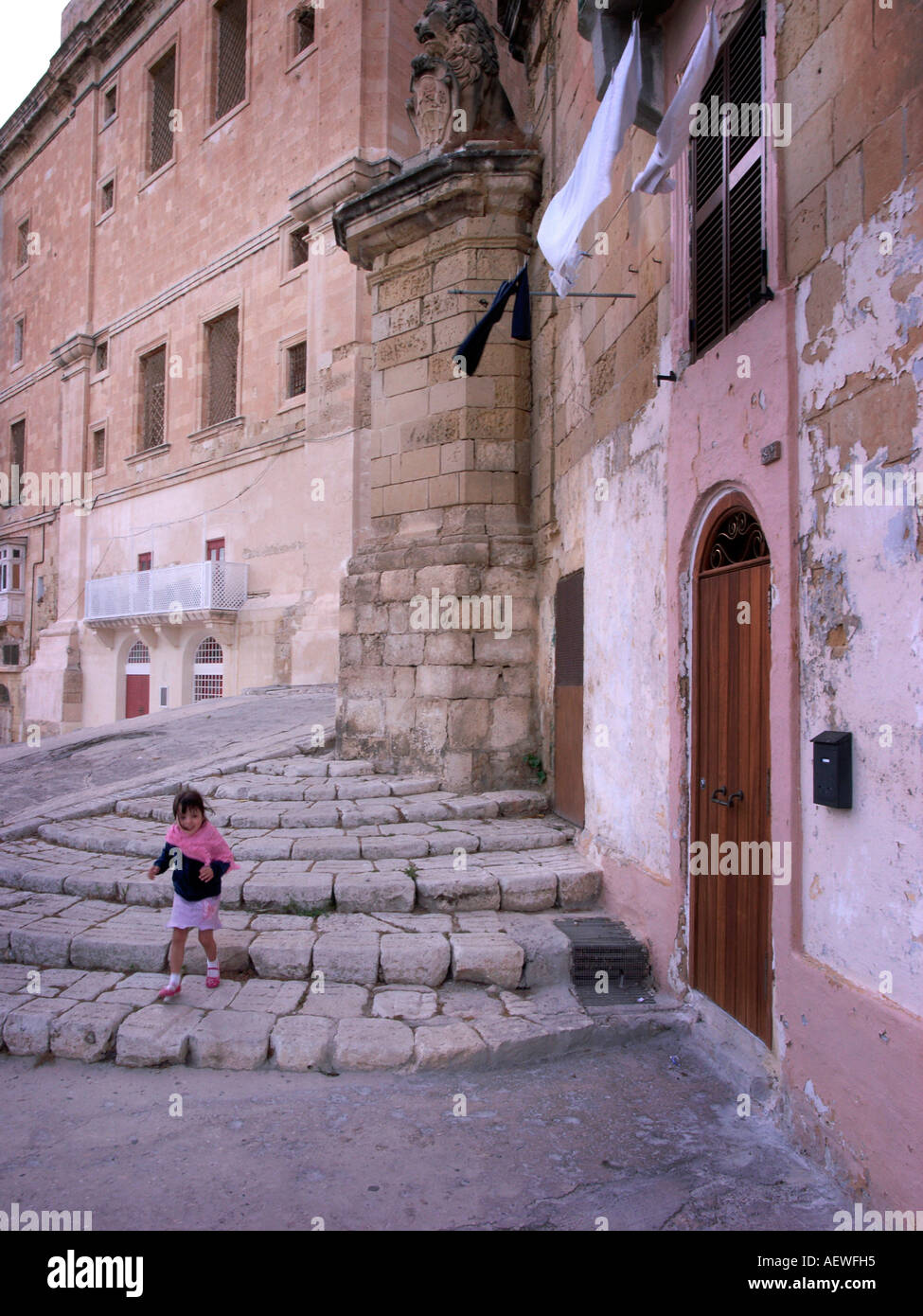 Child running on the cobblestone ,Valletta,Malta Stock Photo - Alamy