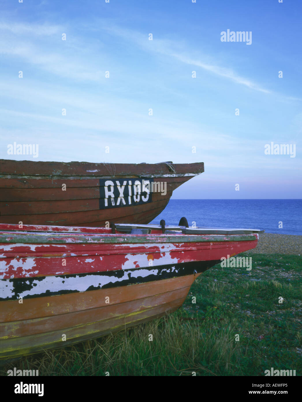Beached fishing boats on beach Cut Out Stock Images & Pictures - Alamy