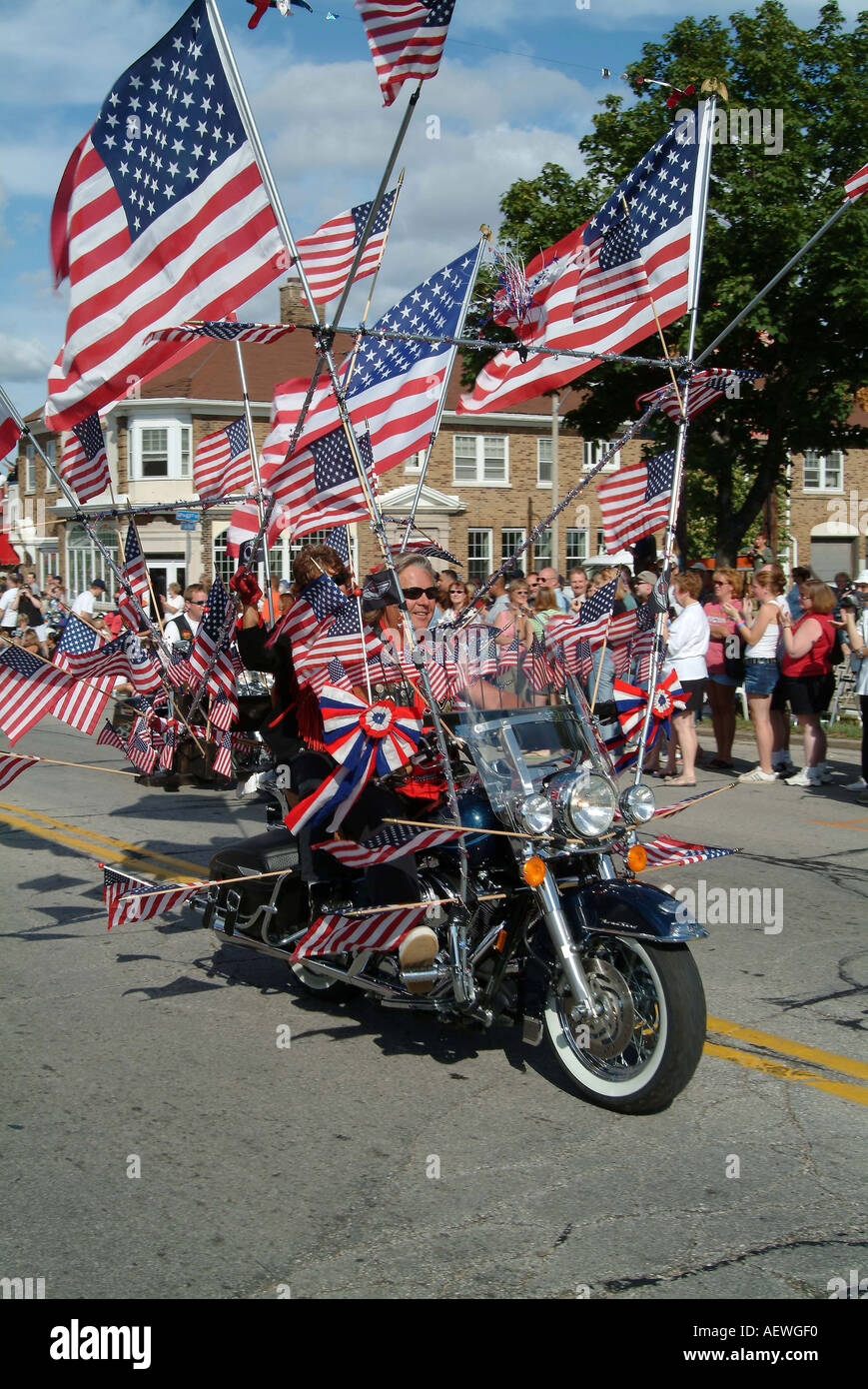 Riding a harley motor cycle with 101 American flags fixed on it Stock ...