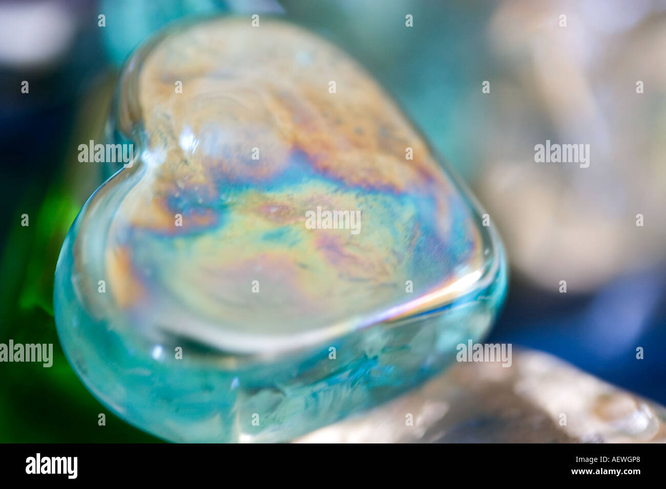 One turquoise blue glass heart Stock Photo - Alamy