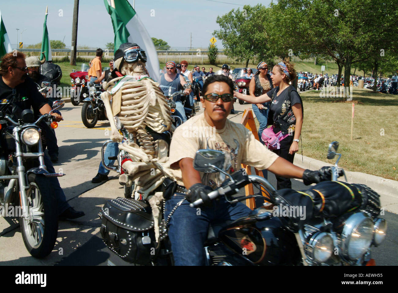 A group of Mexican harley davidson bikers along with man's skeleton ...
