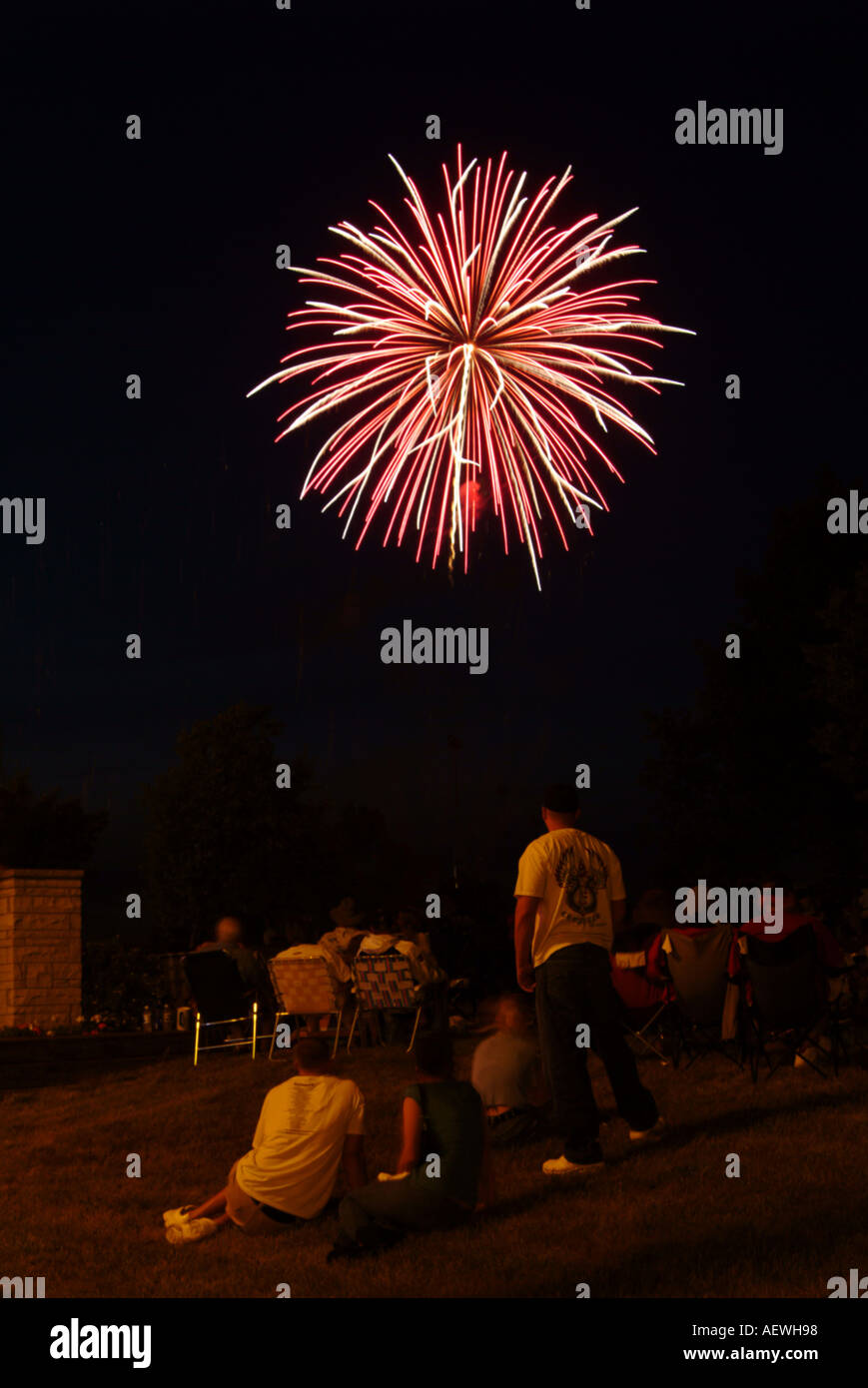 Fireworks on 4th of july with people watching the celebration Stock ...