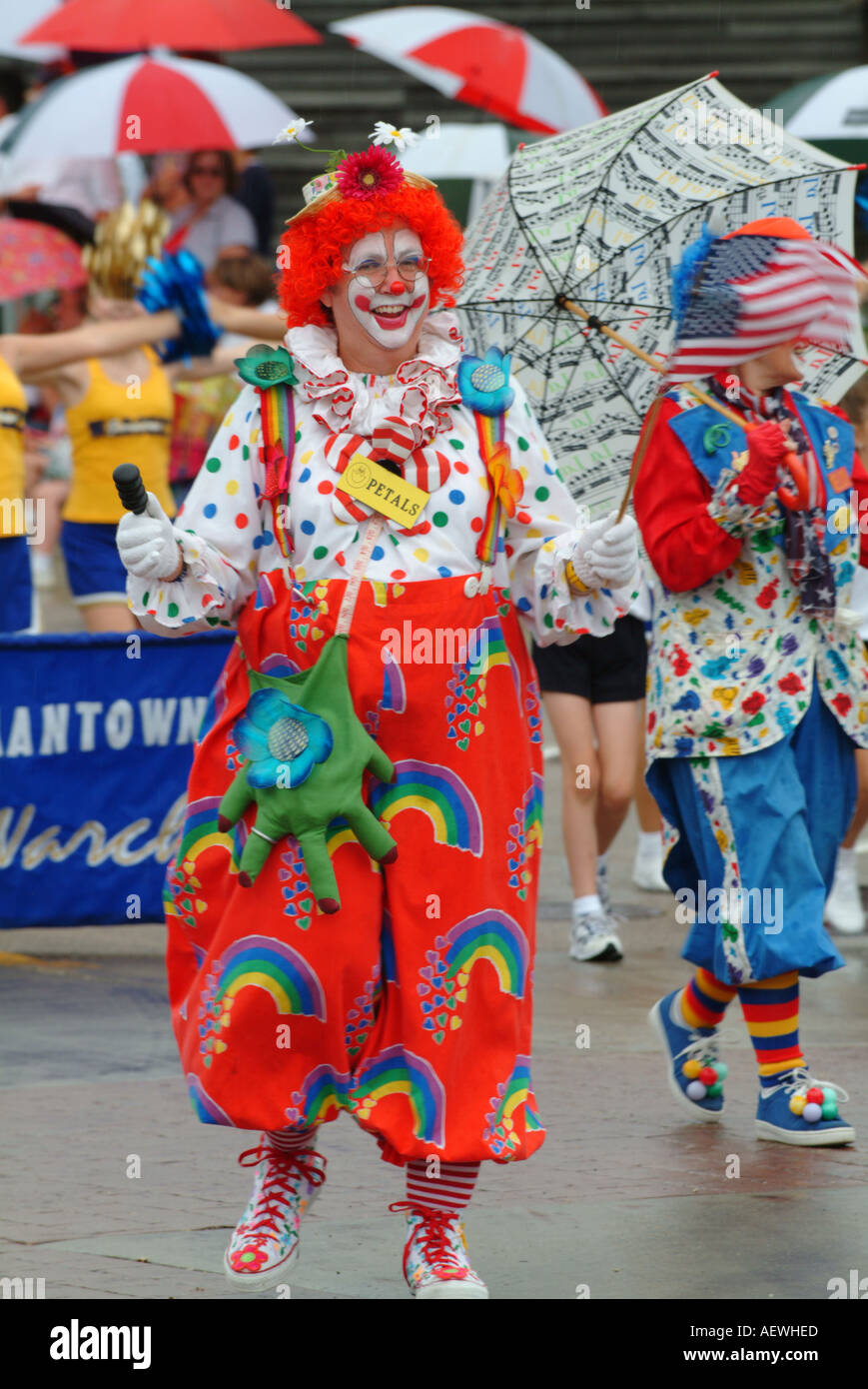 Two clowns acrobatic in independence day parade Stock Photo - Alamy