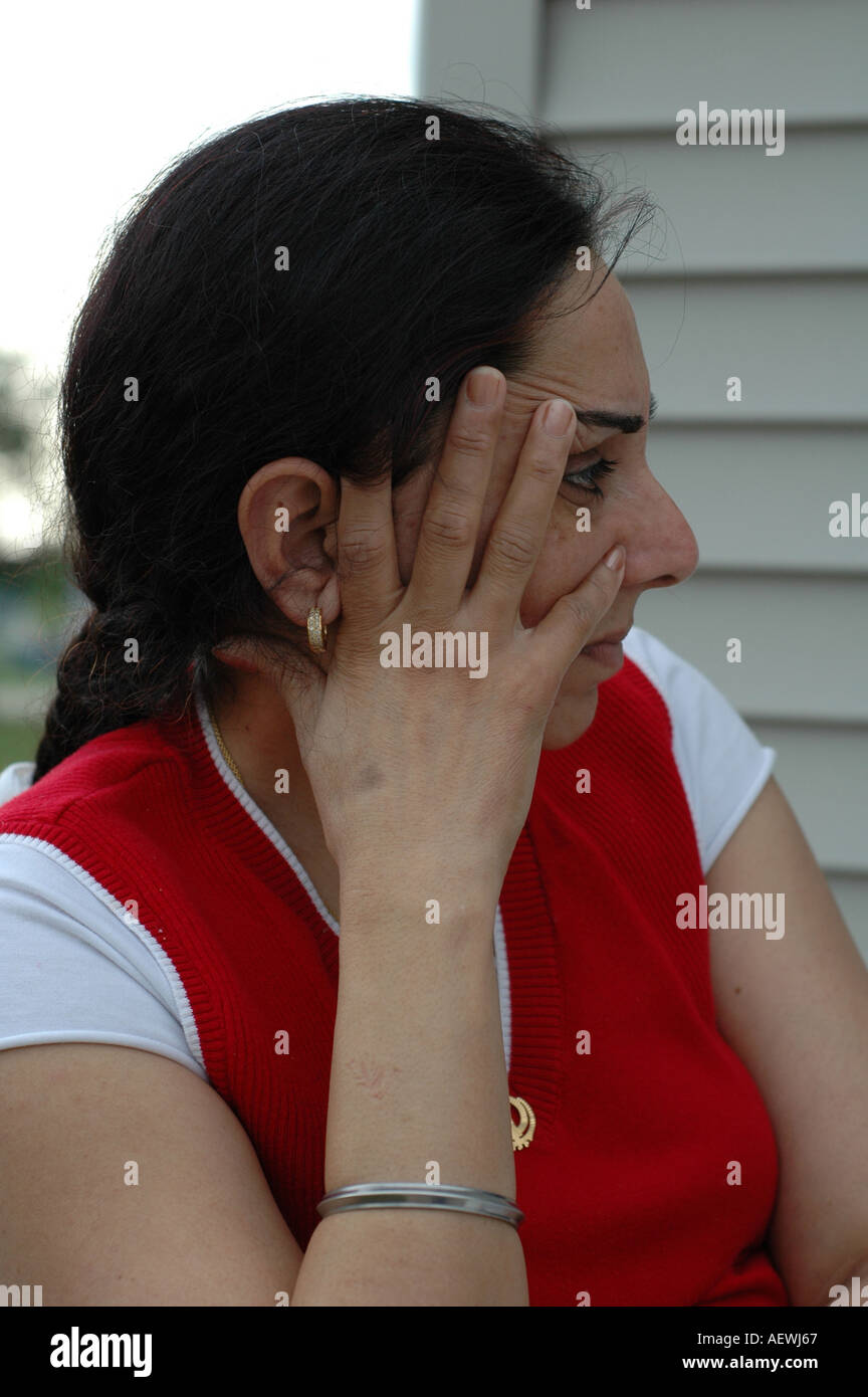Young business woman in serious thought Stock Photo - Alamy