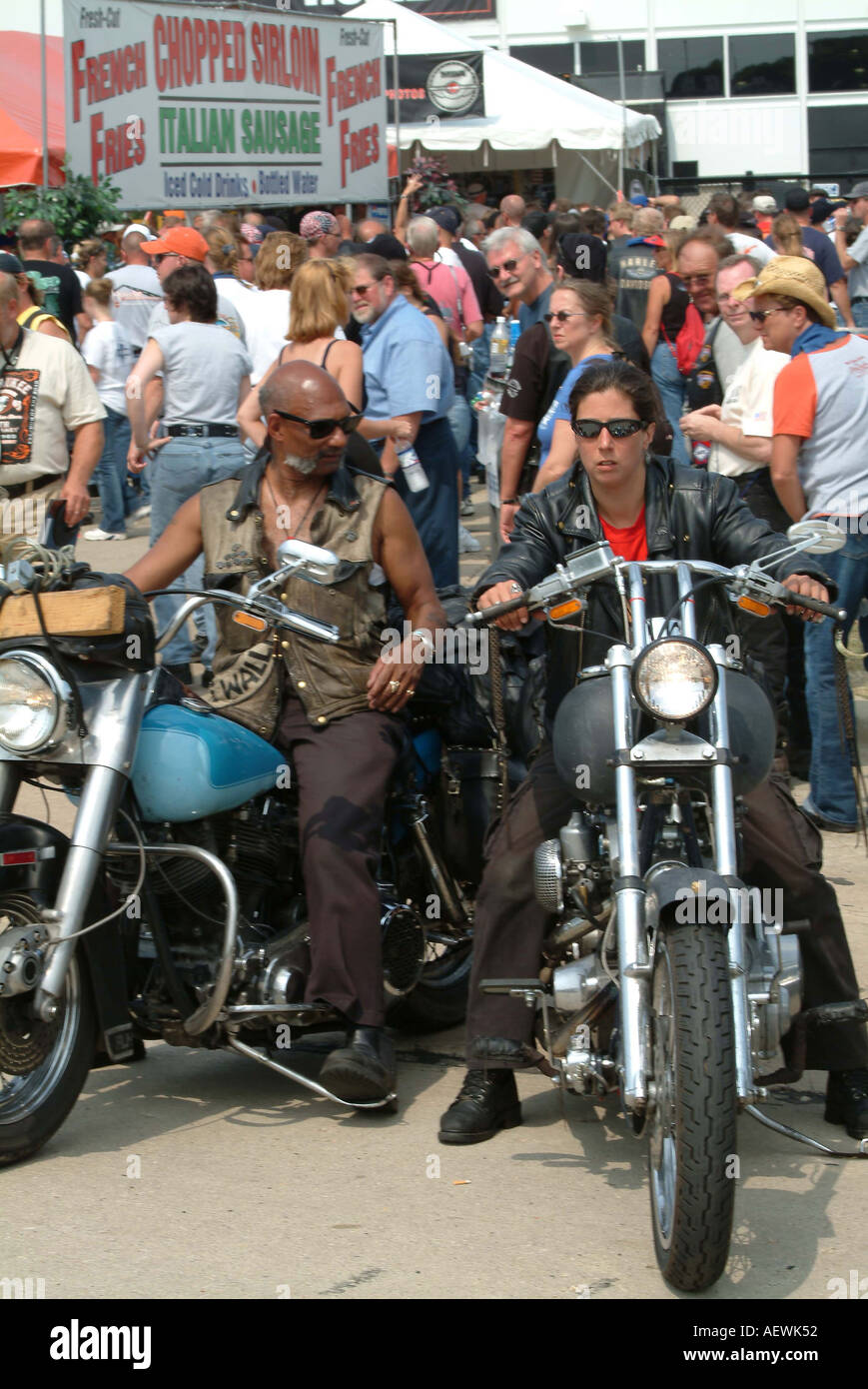 A harley davidson couple hopped on bikes and ready for the ride Stock ...