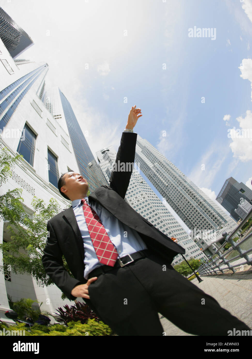 Hand pointing building three hi-res stock photography and images - Alamy