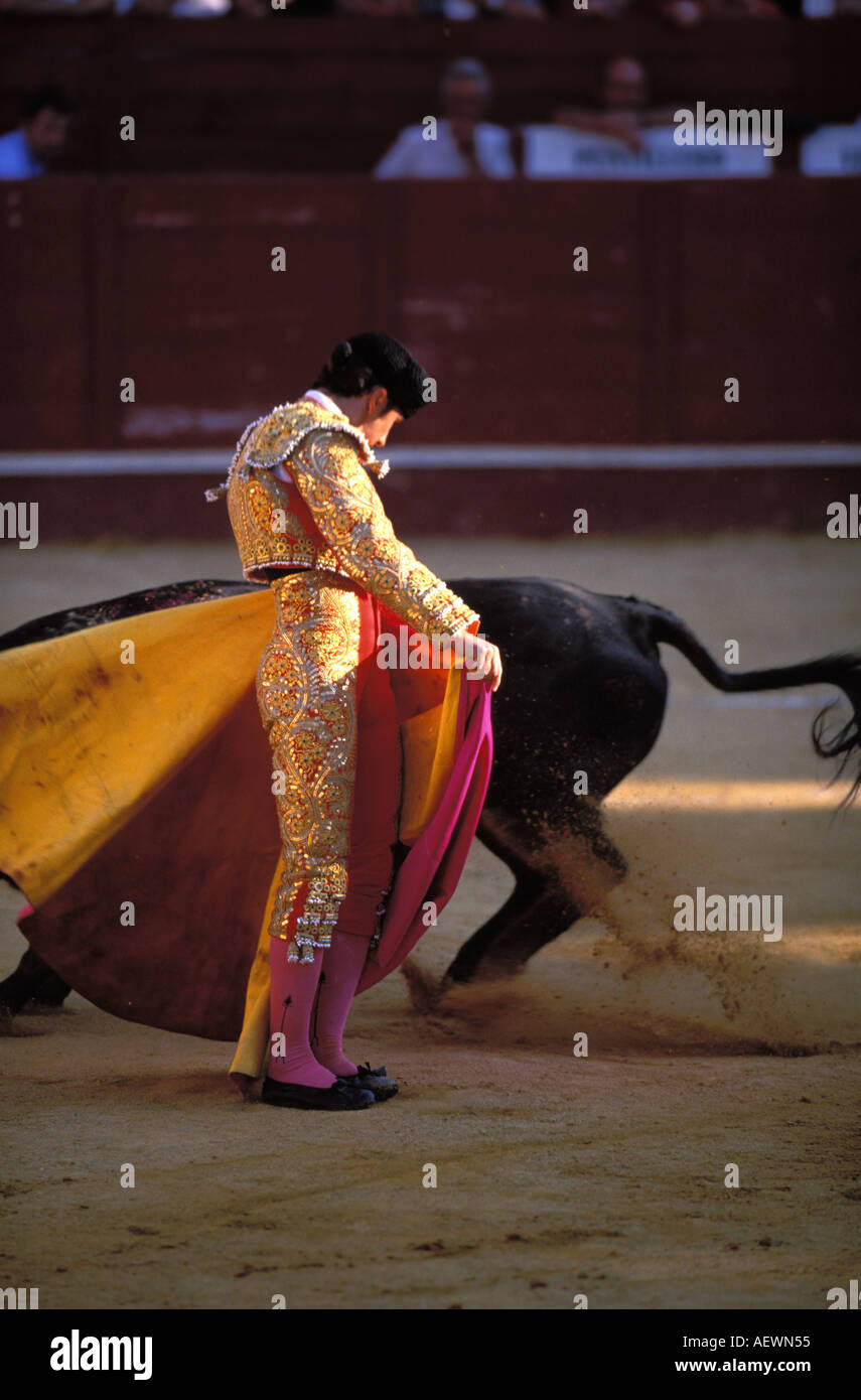 Bullfighter during a move 3rd of a 4 picture sequence Stock Photo - Alamy