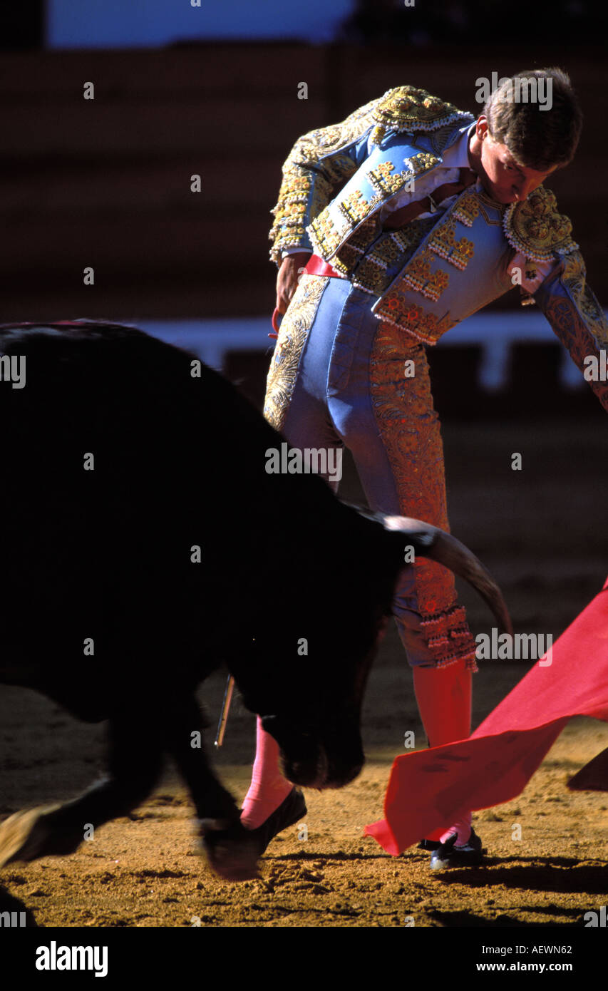 Bullfighter during a move last of a 4 picture sequence Stock Photo - Alamy