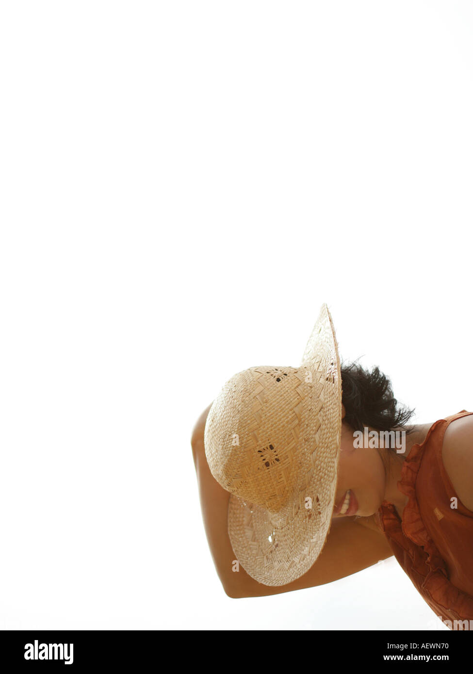 Side profile of a young woman bending Stock Photo - Alamy