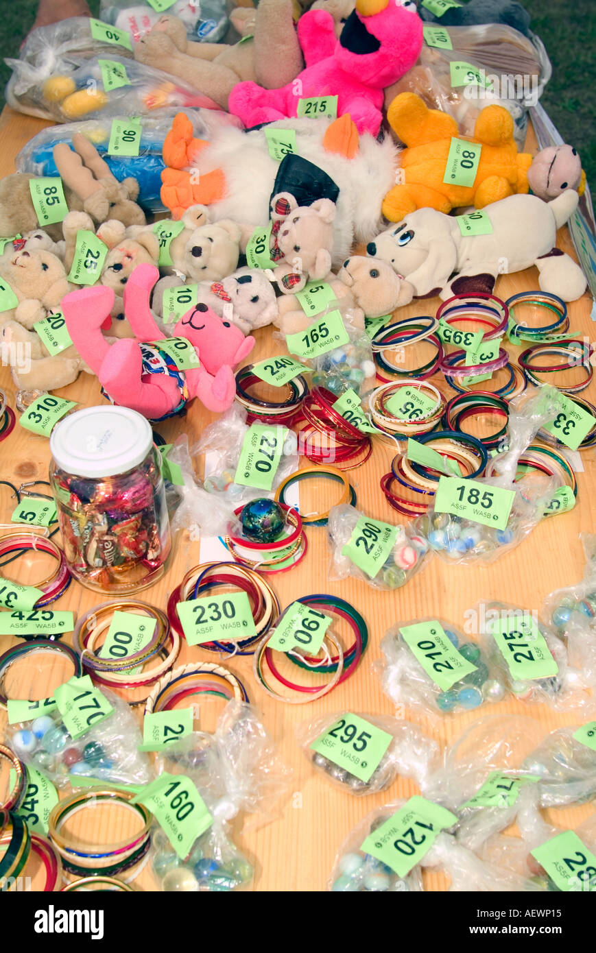 Prizes on display for winning raffle ticket numbers at a housing ...