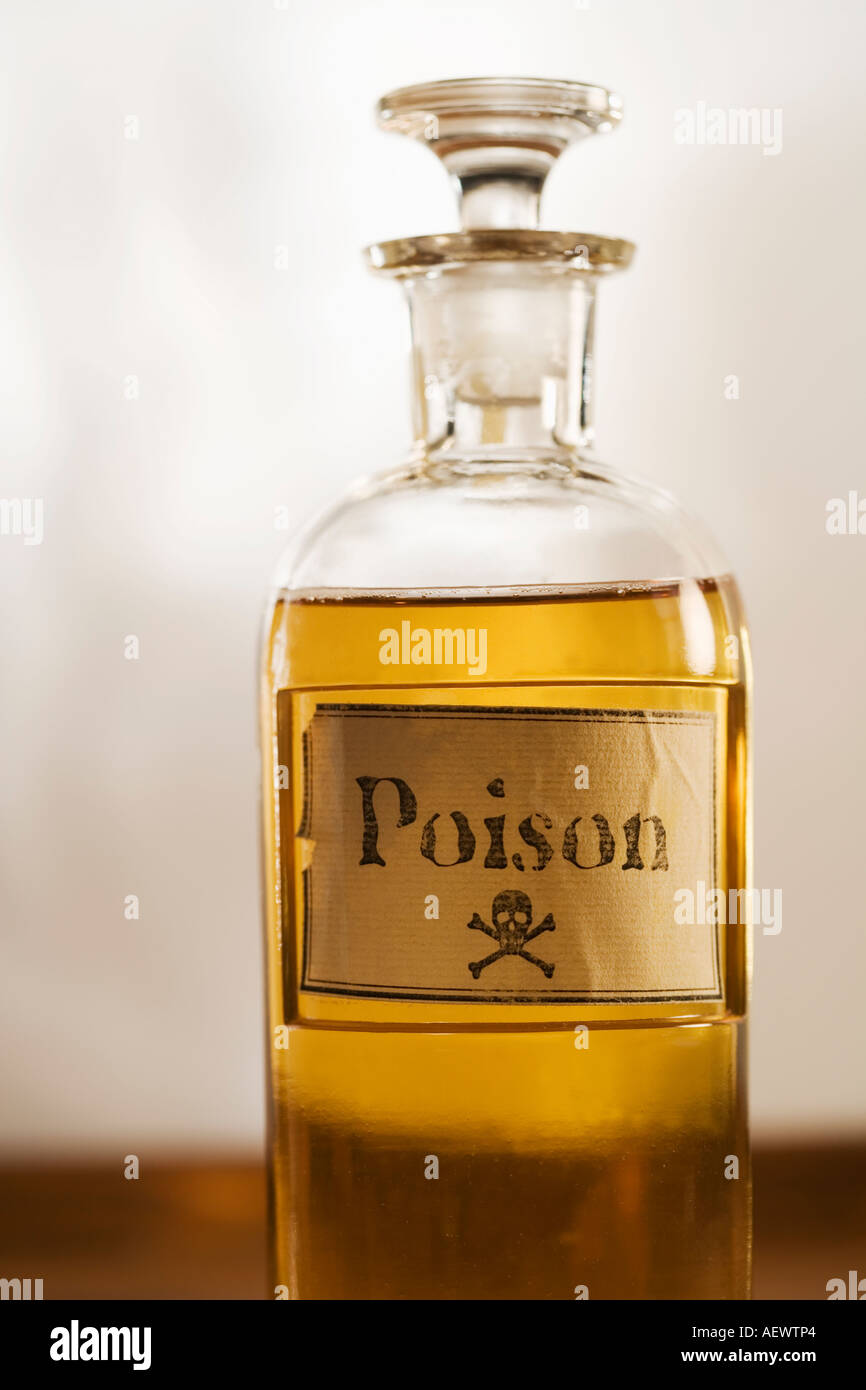 Still life of a bottle of poison Stock Photo - Alamy