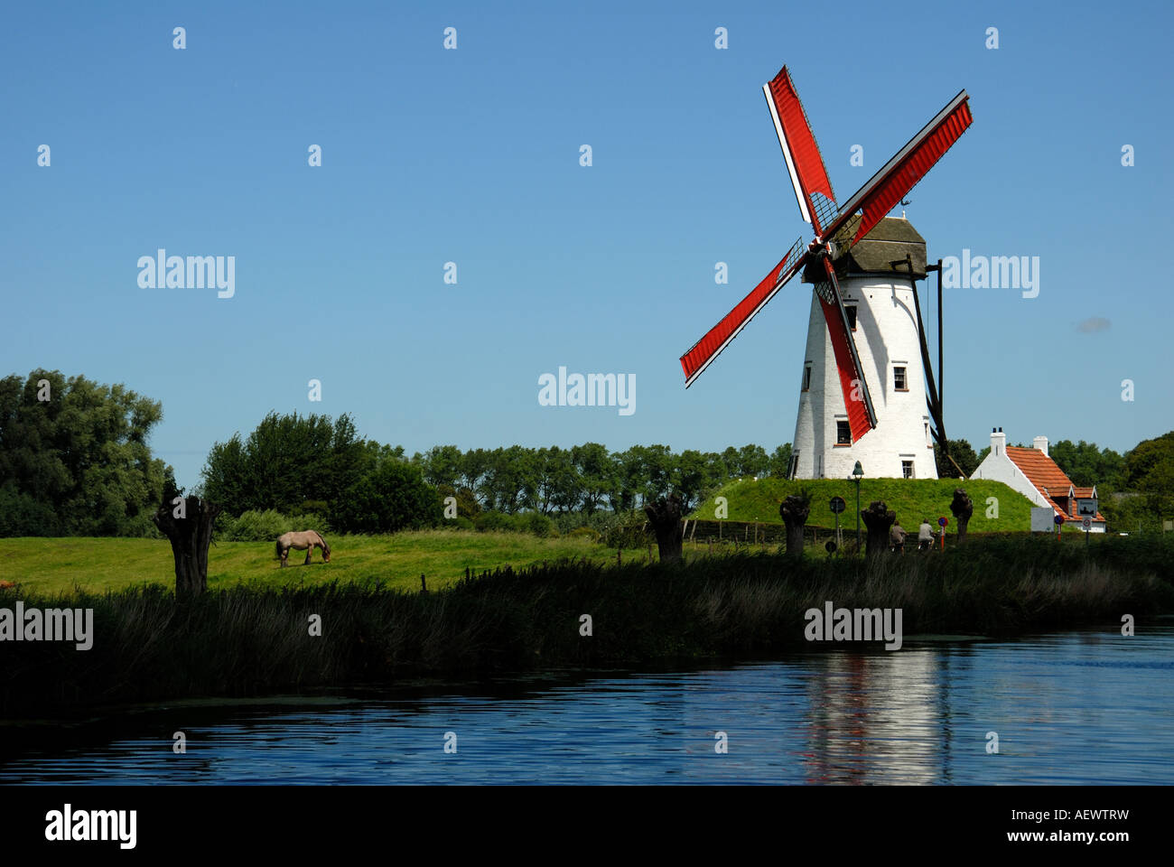 Windmill and canal, Damme Belgium Stock Photo - Alamy
