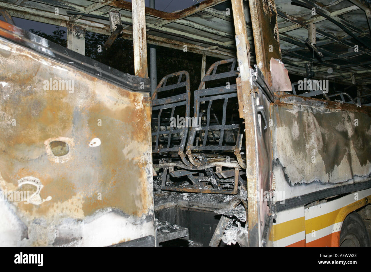 Burned out bus coach at night Belfast Northern Ireland Stock Photo - Alamy