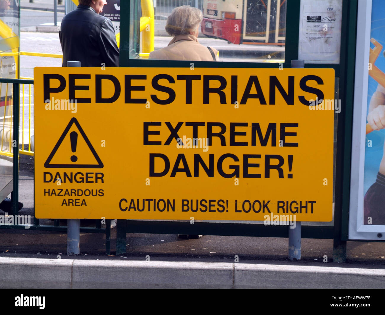 Notice to Pedestrians Warning sign at a bus station Stock Photo - Alamy