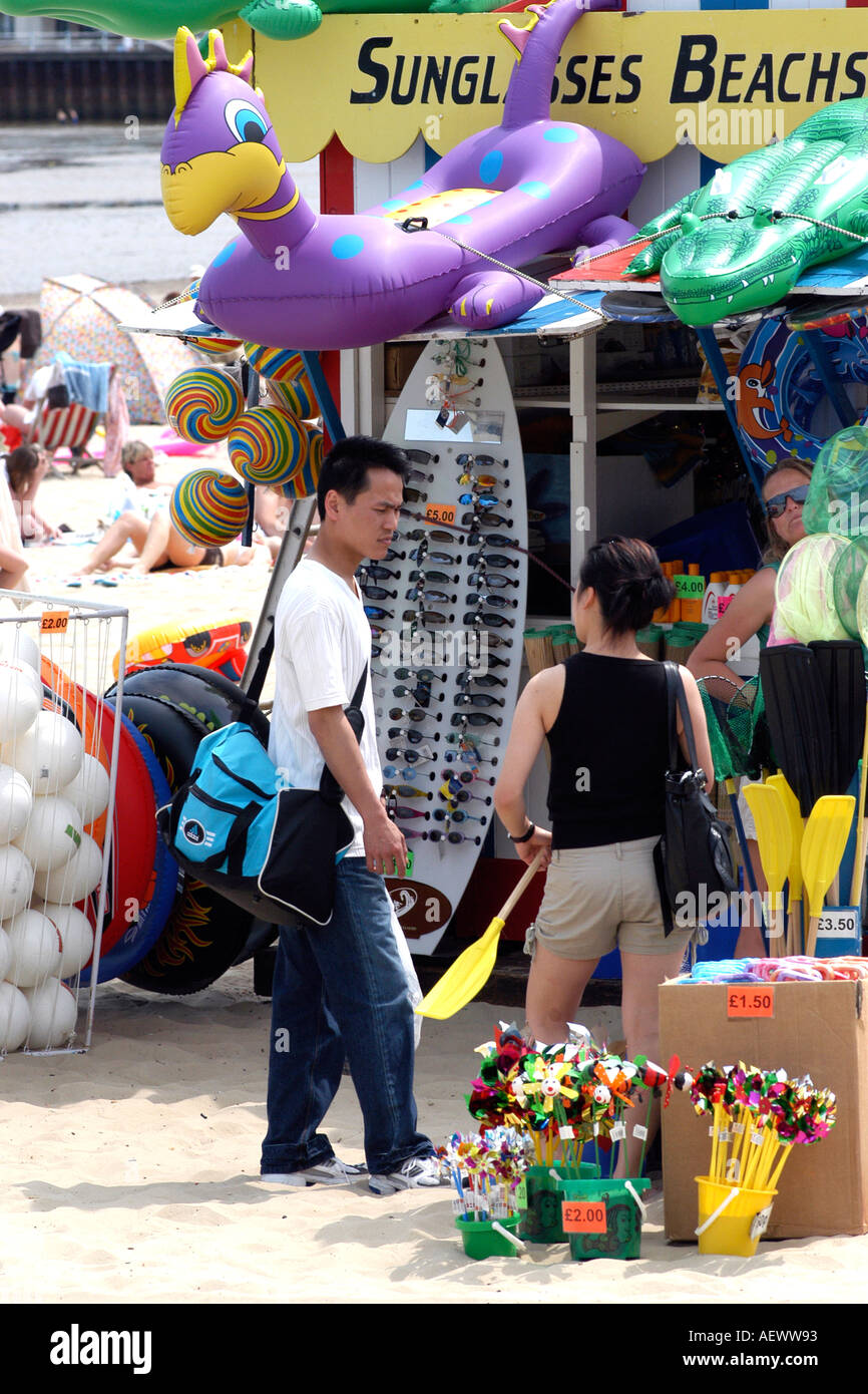 A beach stall selling buckets and spades to the vacationers Stock Photo ...