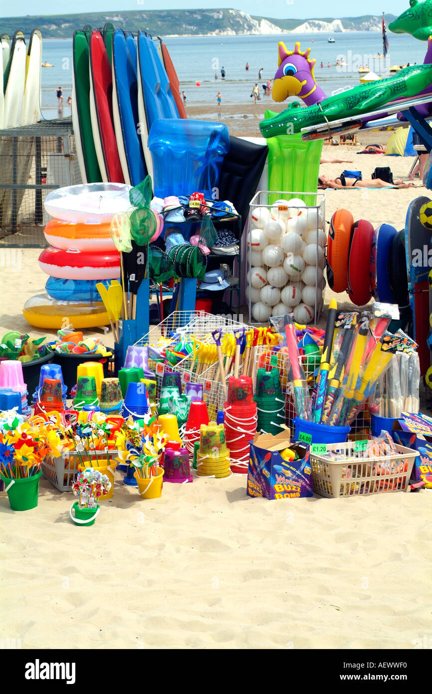 A beach stall selling buckets and spades to the vacationers Stock Photo ...