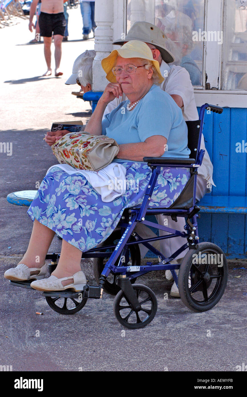 Old crippled woman in wheelchair hi-res stock photography and images ...