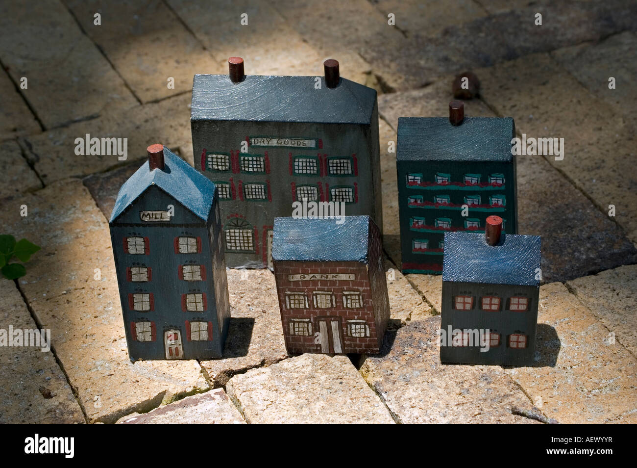 Painted wood block houses, toy homes Stock Photo - Alamy