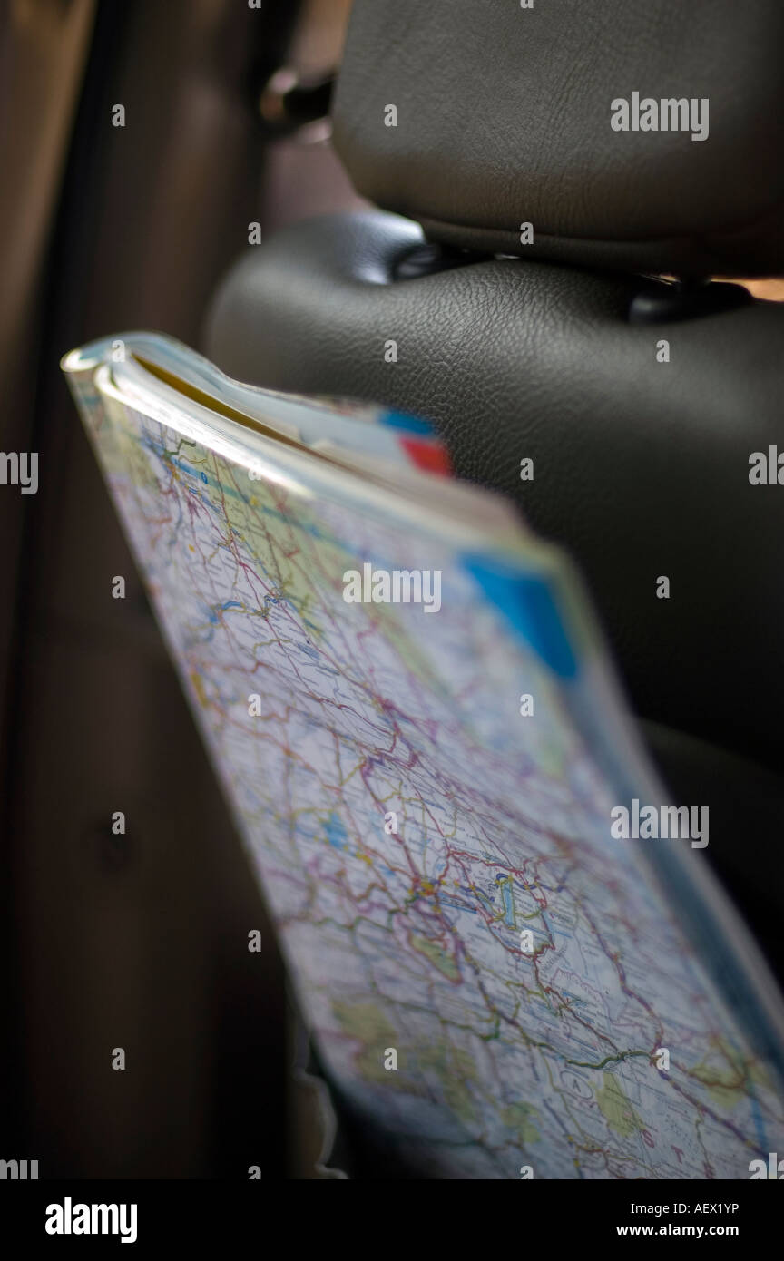Map in the back of a car seat Stock Photo - Alamy