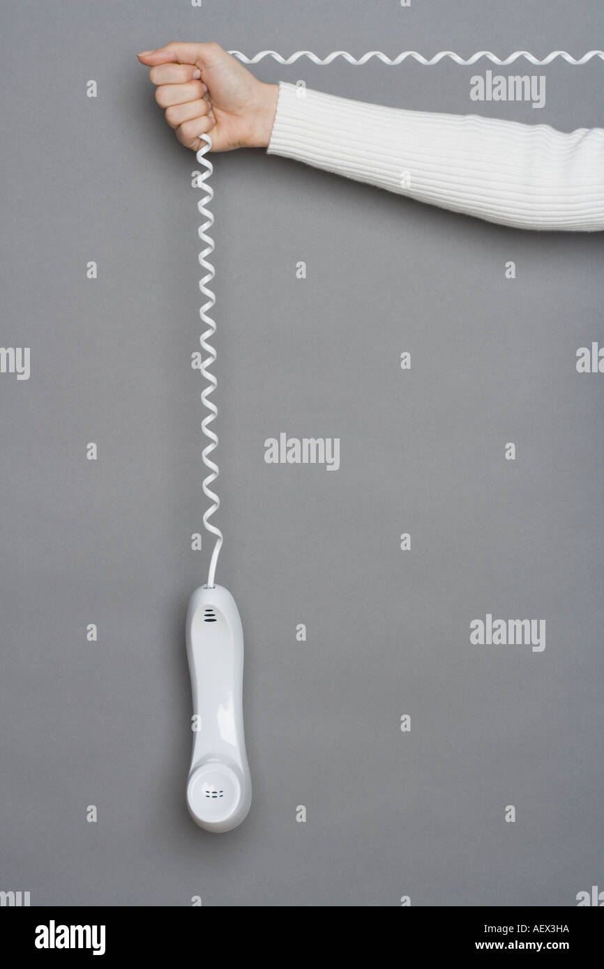 Telephone receiver dangle hi-res stock photography and images - Alamy