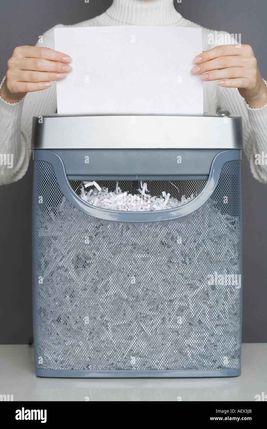 Woman shredding paper hi-res stock photography and images - Alamy