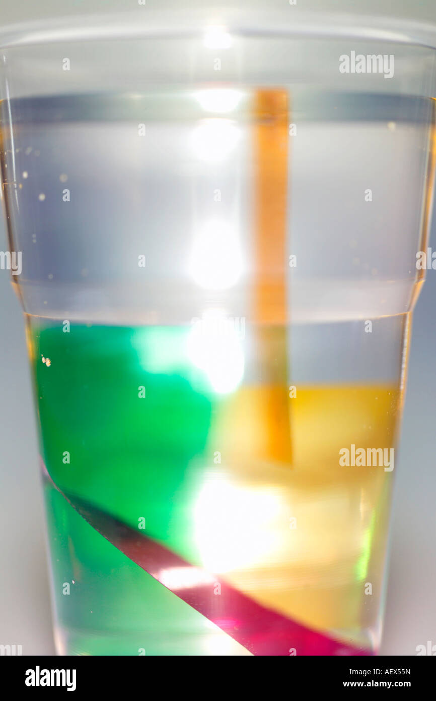 Plastic shapes in a plastic beaker Stock Photo - Alamy
