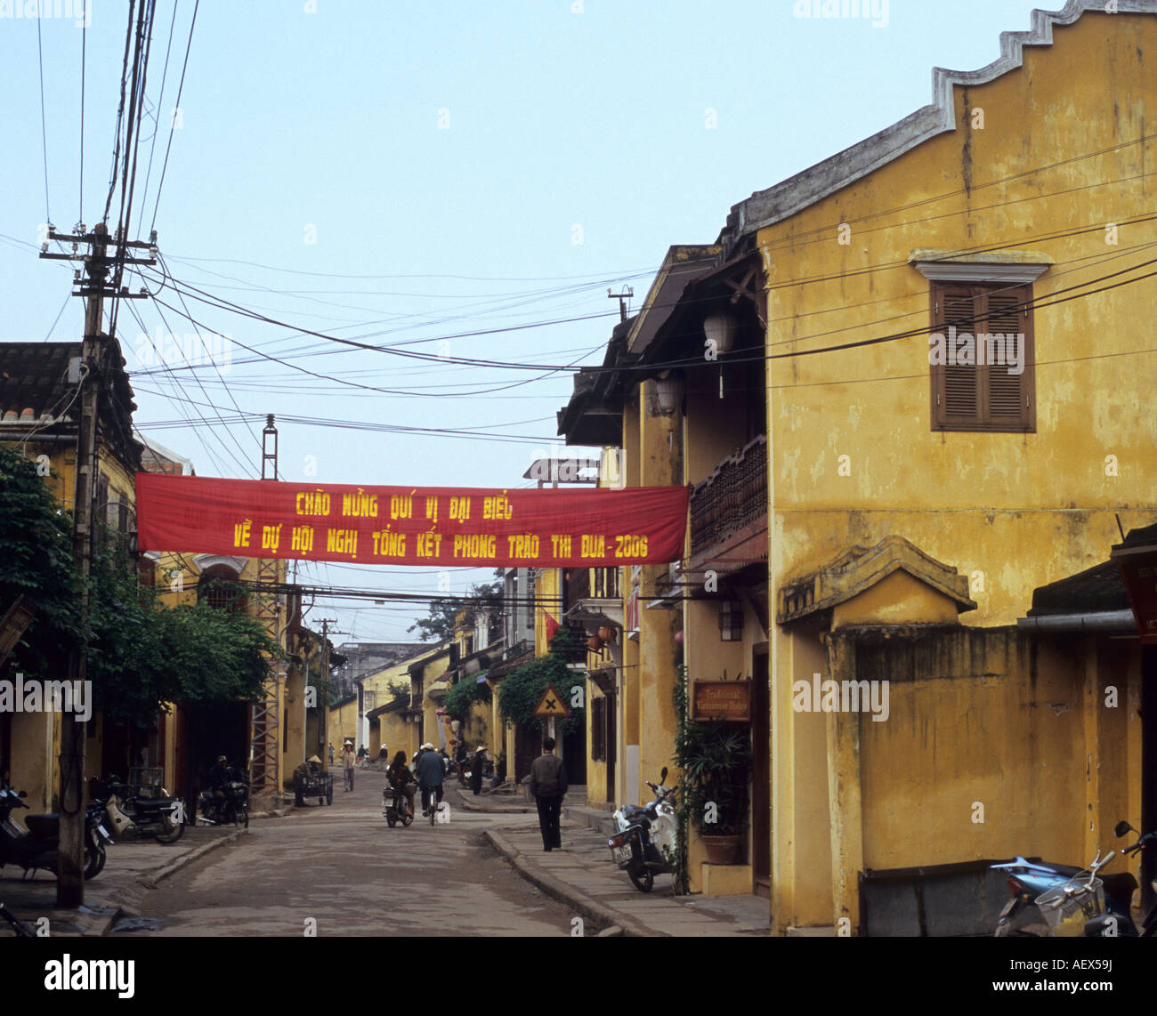 Early morning street scene with traditional old buildings in Tran Phu ...