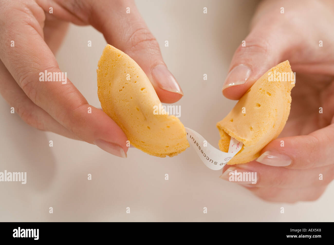 Breaking fortune cookies hi-res stock photography and images - Alamy