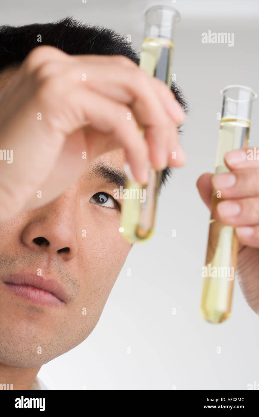 Scientist conducting an experiment Stock Photo - Alamy