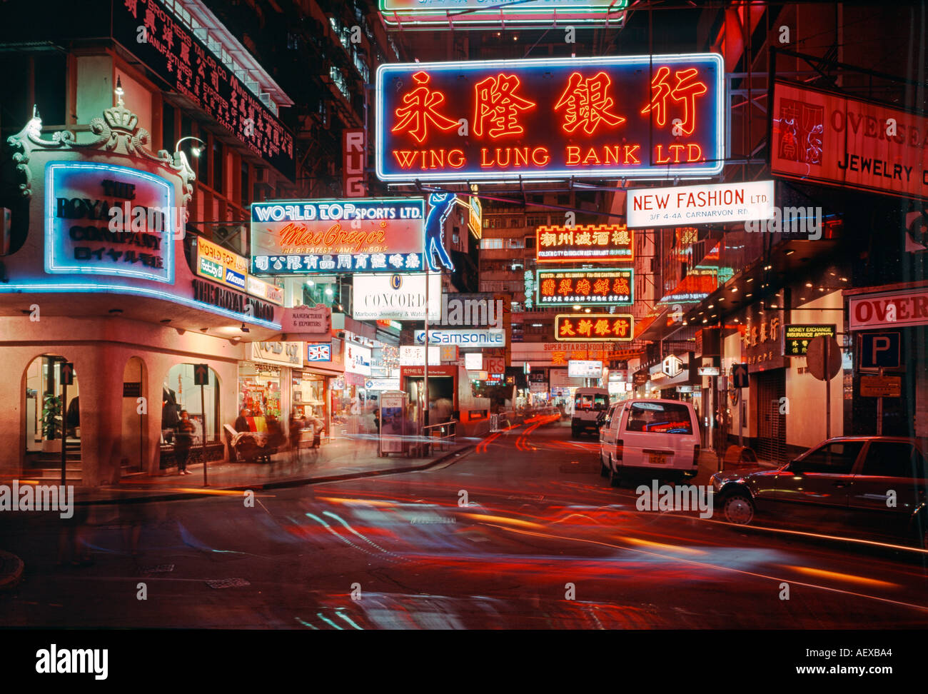 Neon lit roads traffic on Kowloon in Hong Kong Stock Photo - Alamy