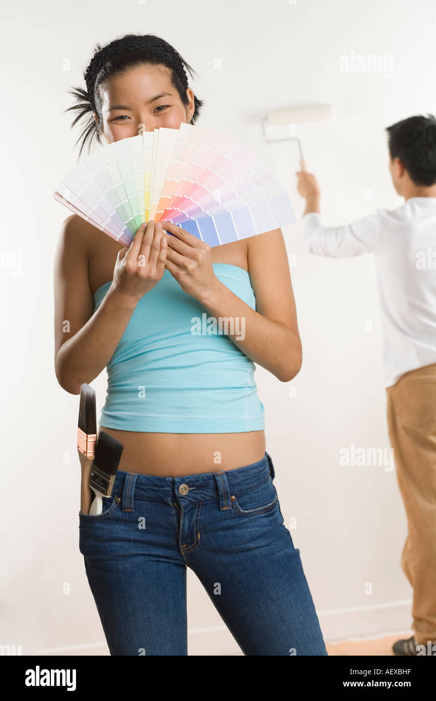 Portrait of woman with color samples Stock Photo - Alamy