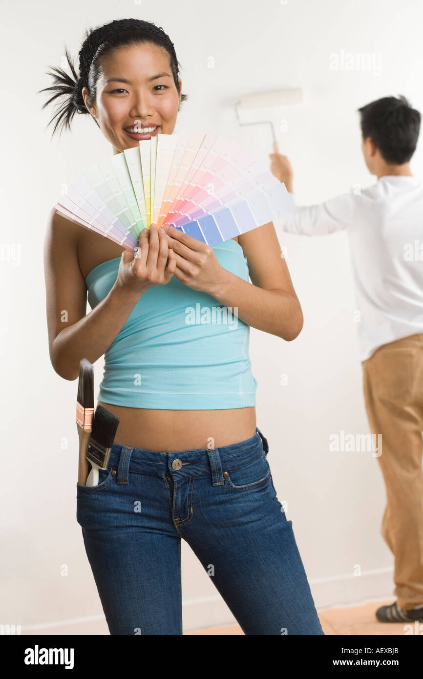 Portrait of woman with color samples Stock Photo - Alamy