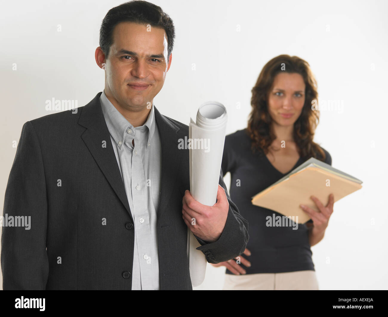 Professional male holding blueprints Stock Photo - Alamy