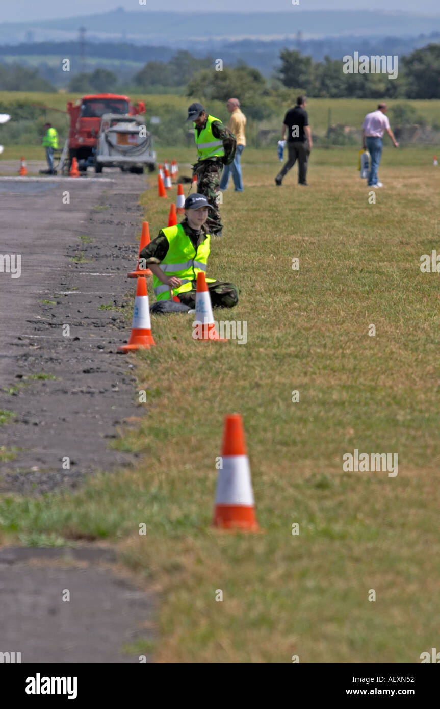 Cadets marshalling aircraft at the PFA Rally Stock Photo - Alamy