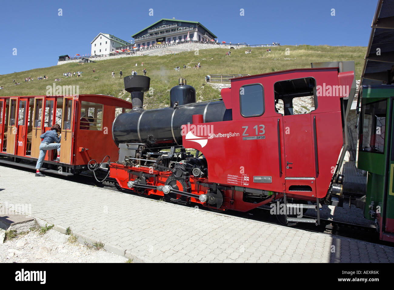 Red train coaches hi-res stock photography and images - Alamy