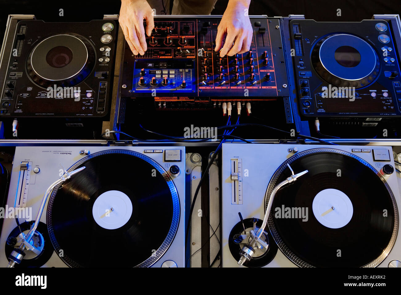 Person mixing music in a nightclub Stock Photo - Alamy