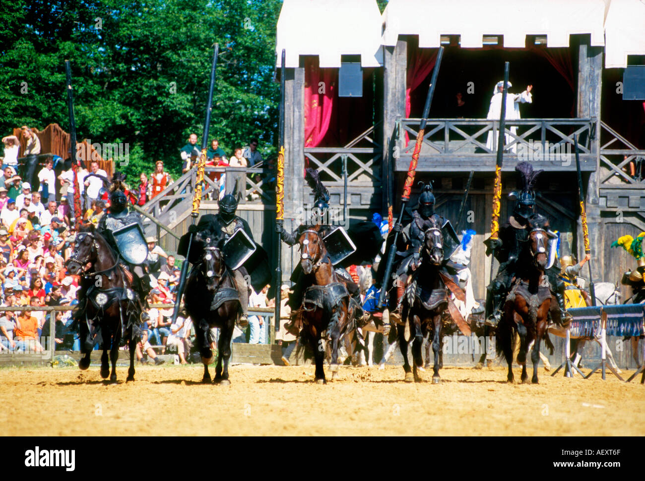 Knights on horse holding lance flag in tournament Medieval festival in ...