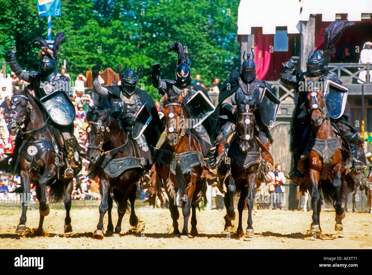 Knights on horse holding lance flag in tournament Medieval festival in ...