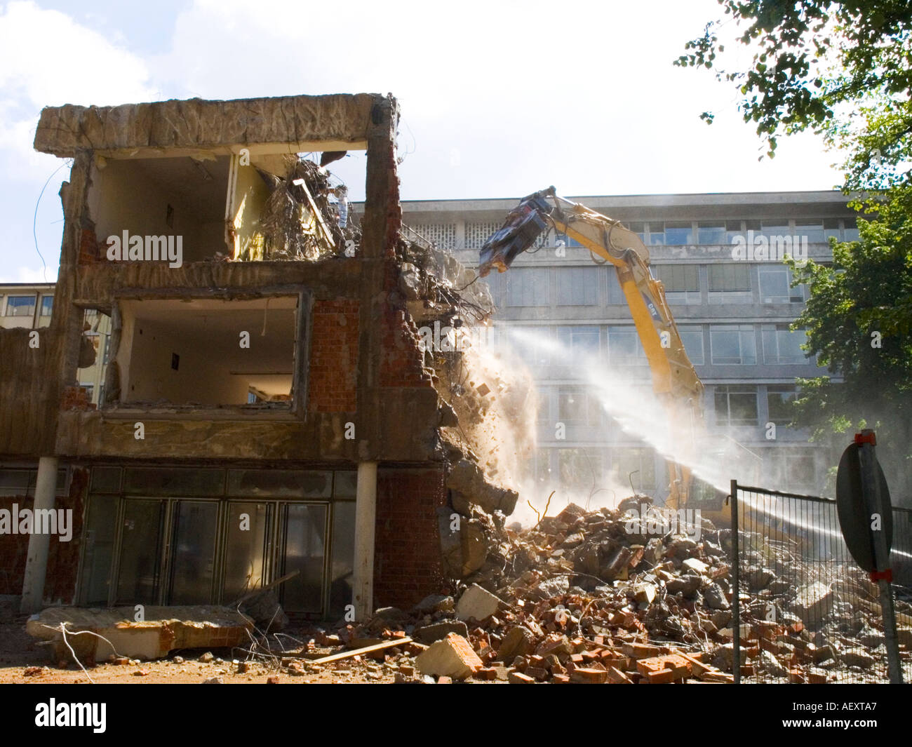 Man splashing water to the demolishing house architect architecture ...