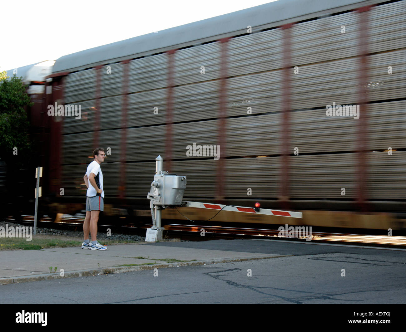 Passing freight train Stock Photo - Alamy